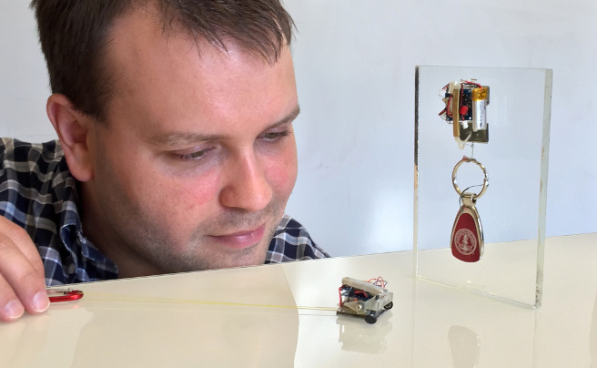 MicroTugs ant robots pull above their weight