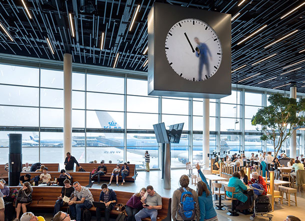 Blue overalls power real-time clock at Schiphol Airport | Electronics ...